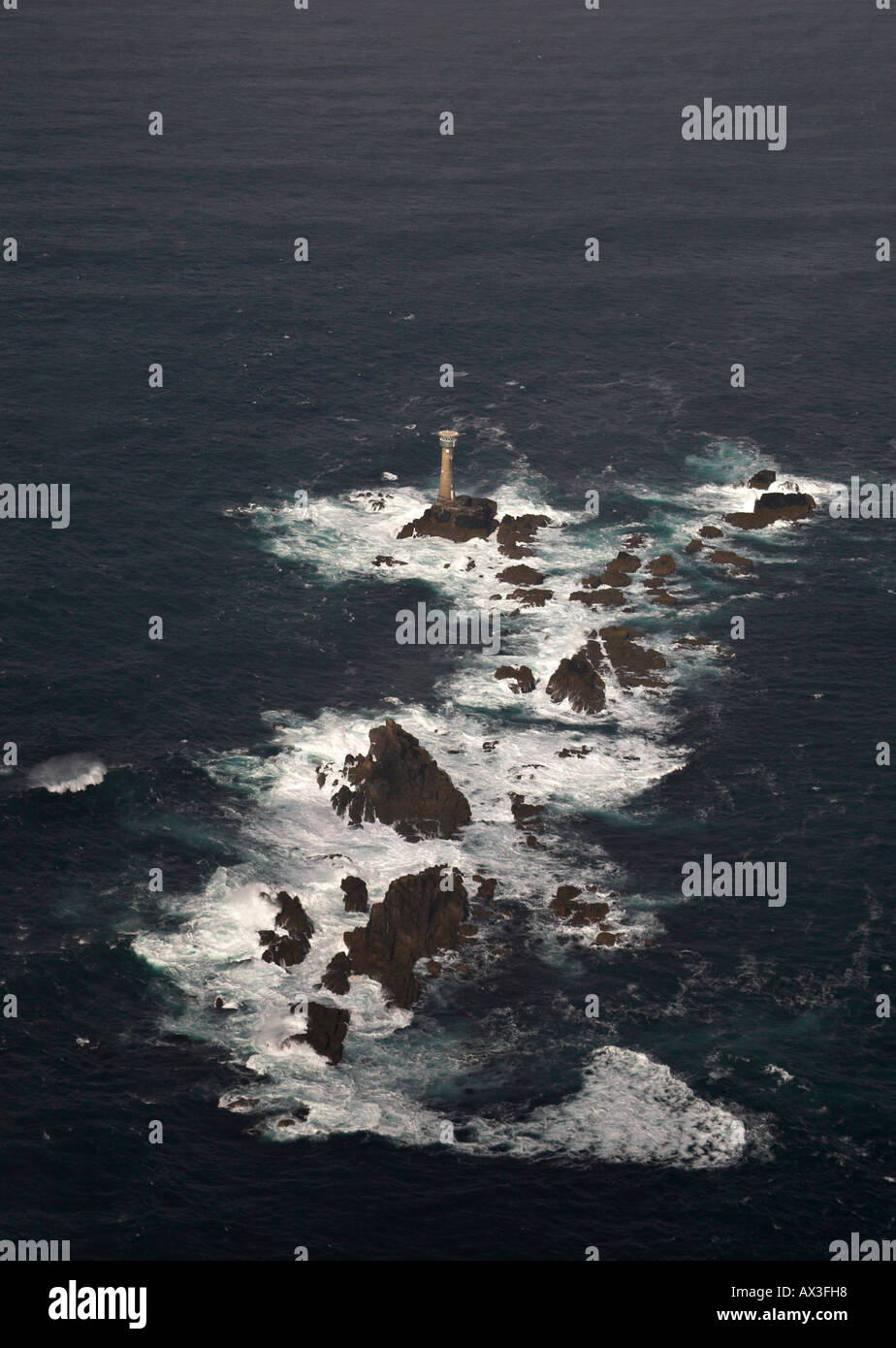 Aerial view from Isles of Scilly helicopter Longships lighthouse Lands ...