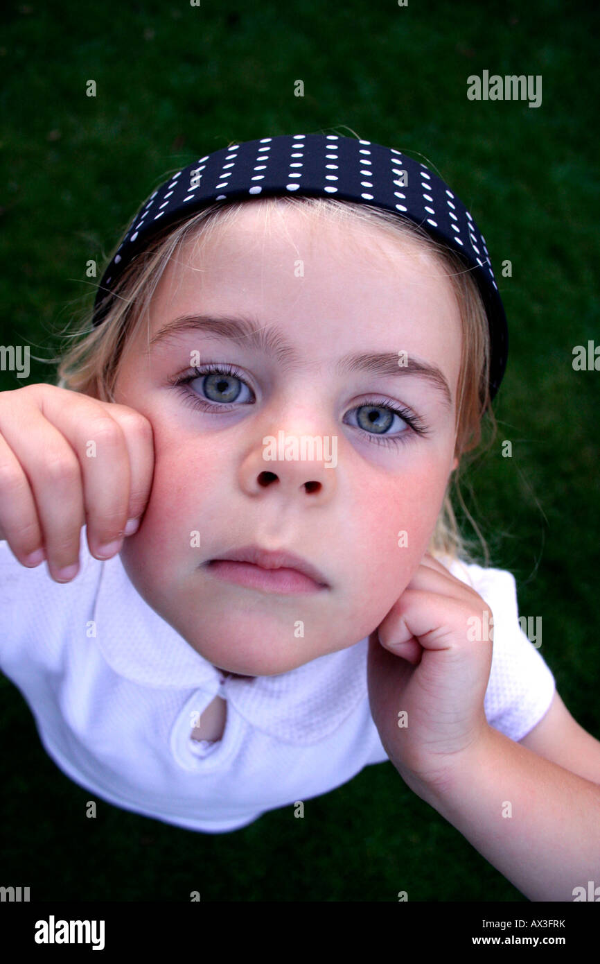 4 Year Old Girl Looking Up At Camera Stock Photo Alamy 4-year-old-girl-looking-up-at-camera-stock-photo-alamy