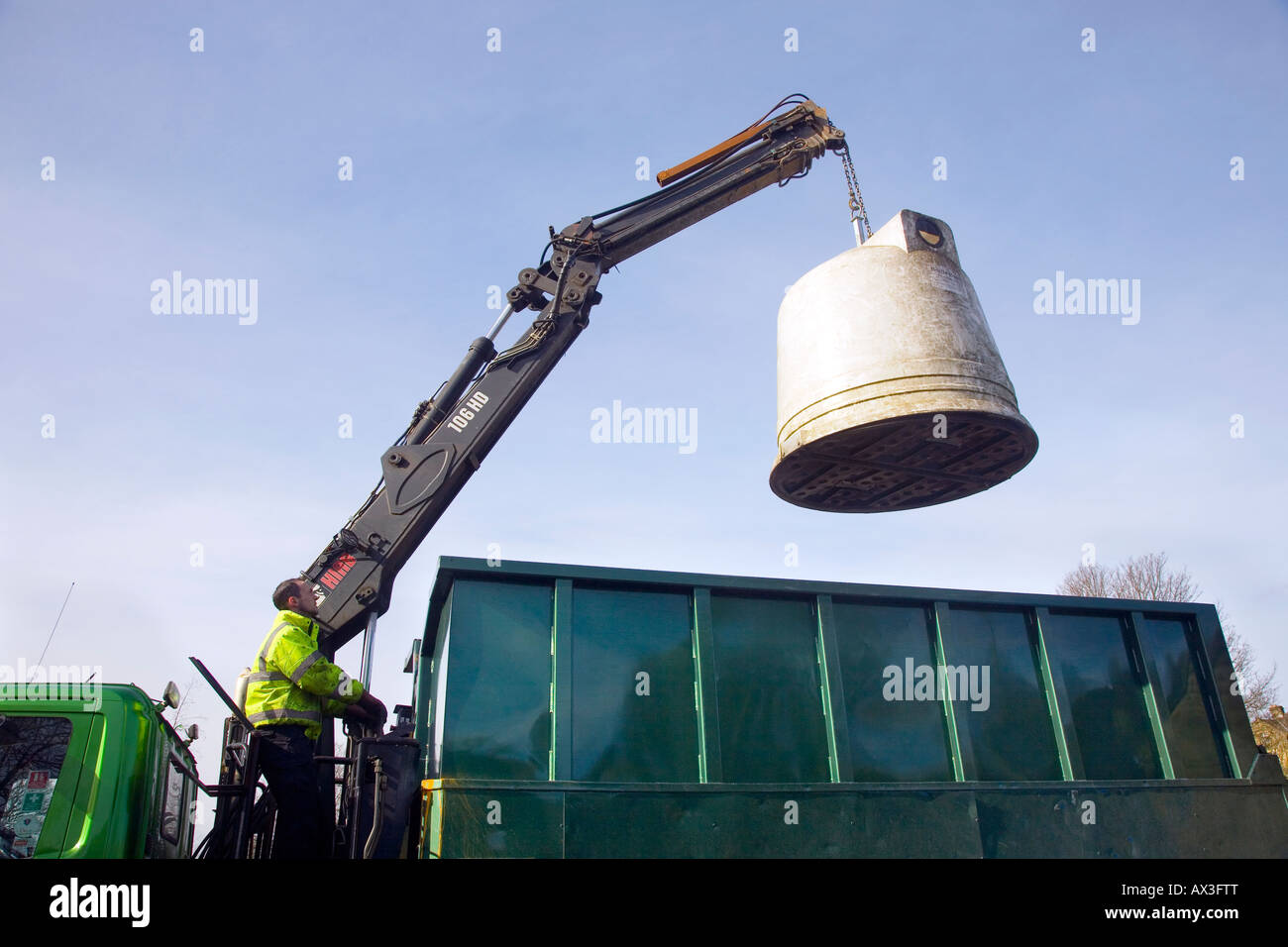 HIAB operator emptying the glass recycling, lorry, refuse, garbage ...