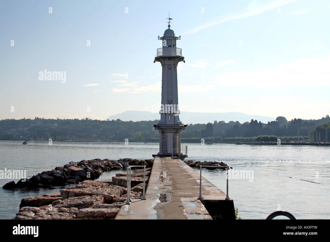 Traditional european lighthouse in lake Geneva Switzerland Stock Photo ...