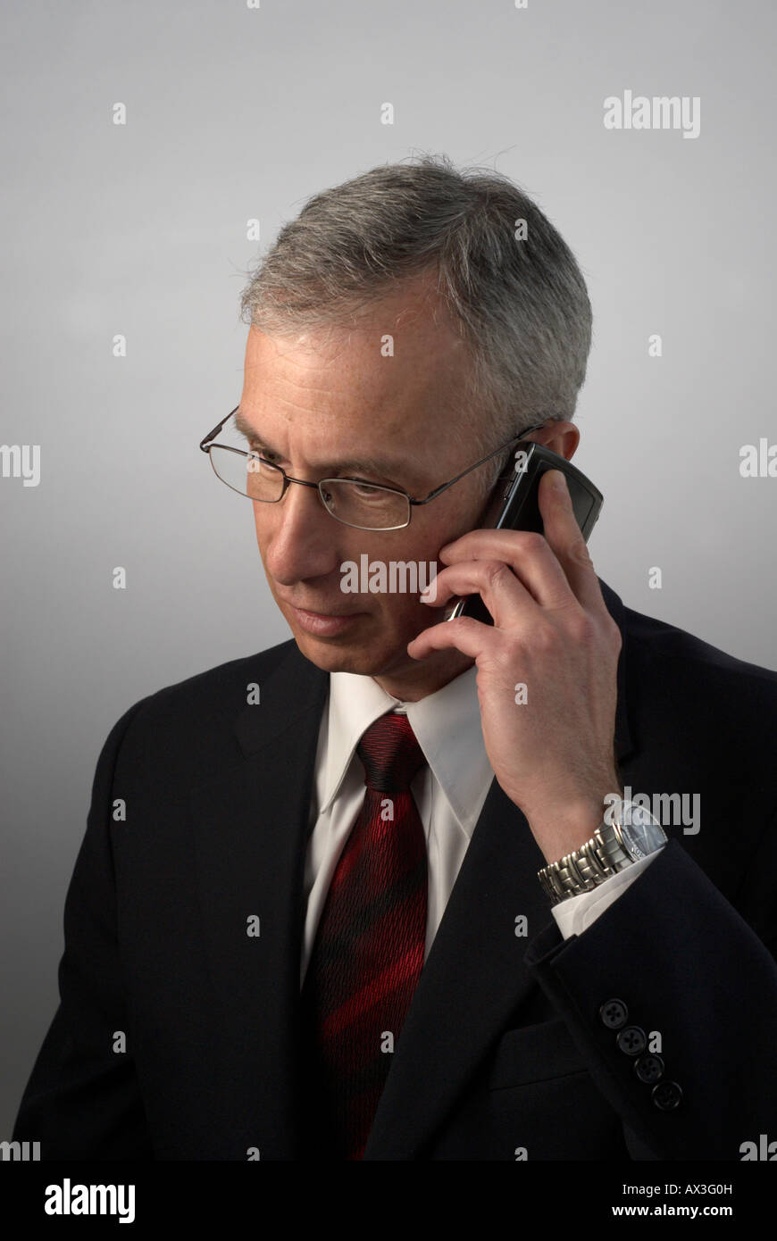 Senior executive on mobile phone. Ceo talks to perspective clients ...