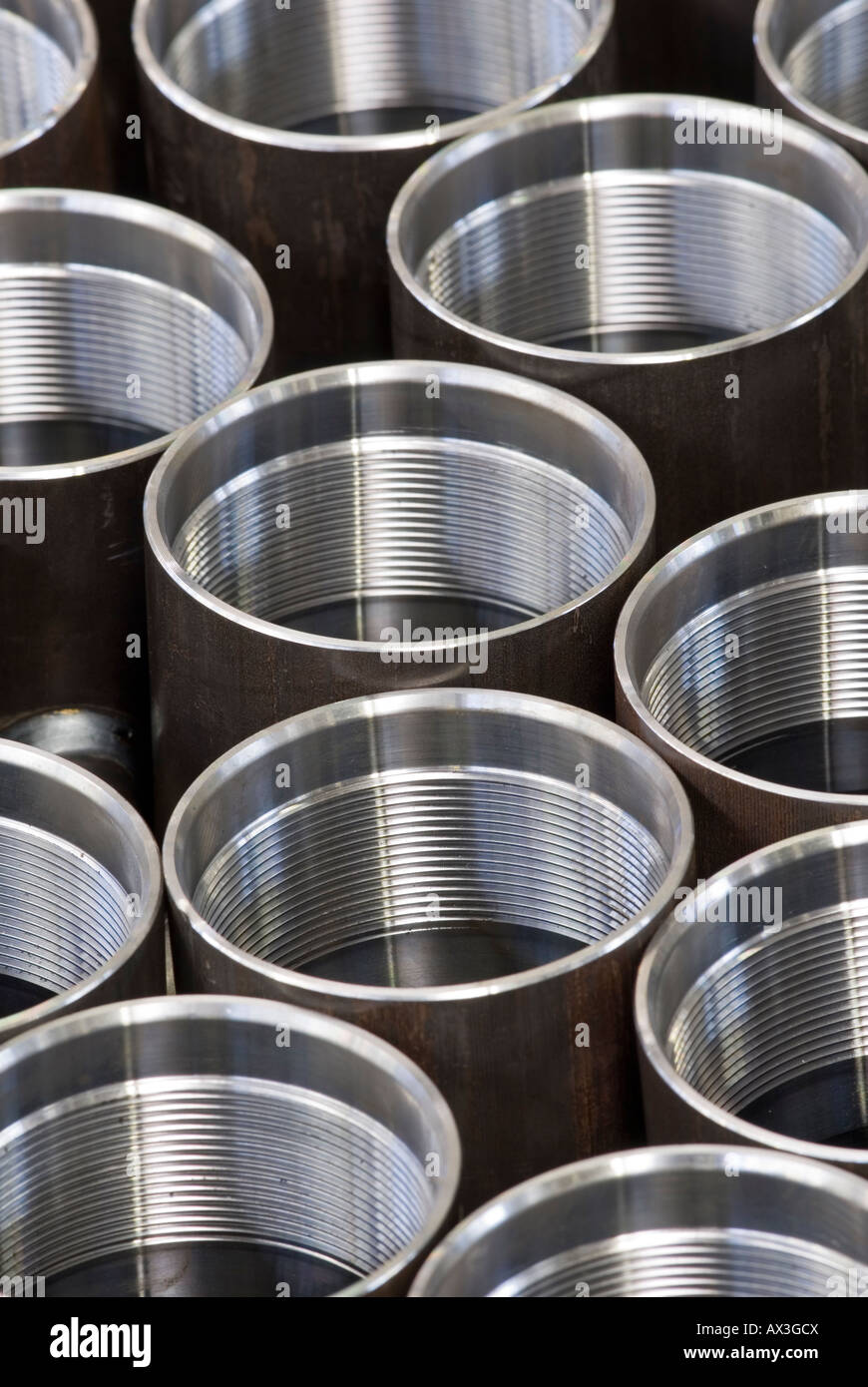 threaded industrial steel tubes Stock Photo - Alamy