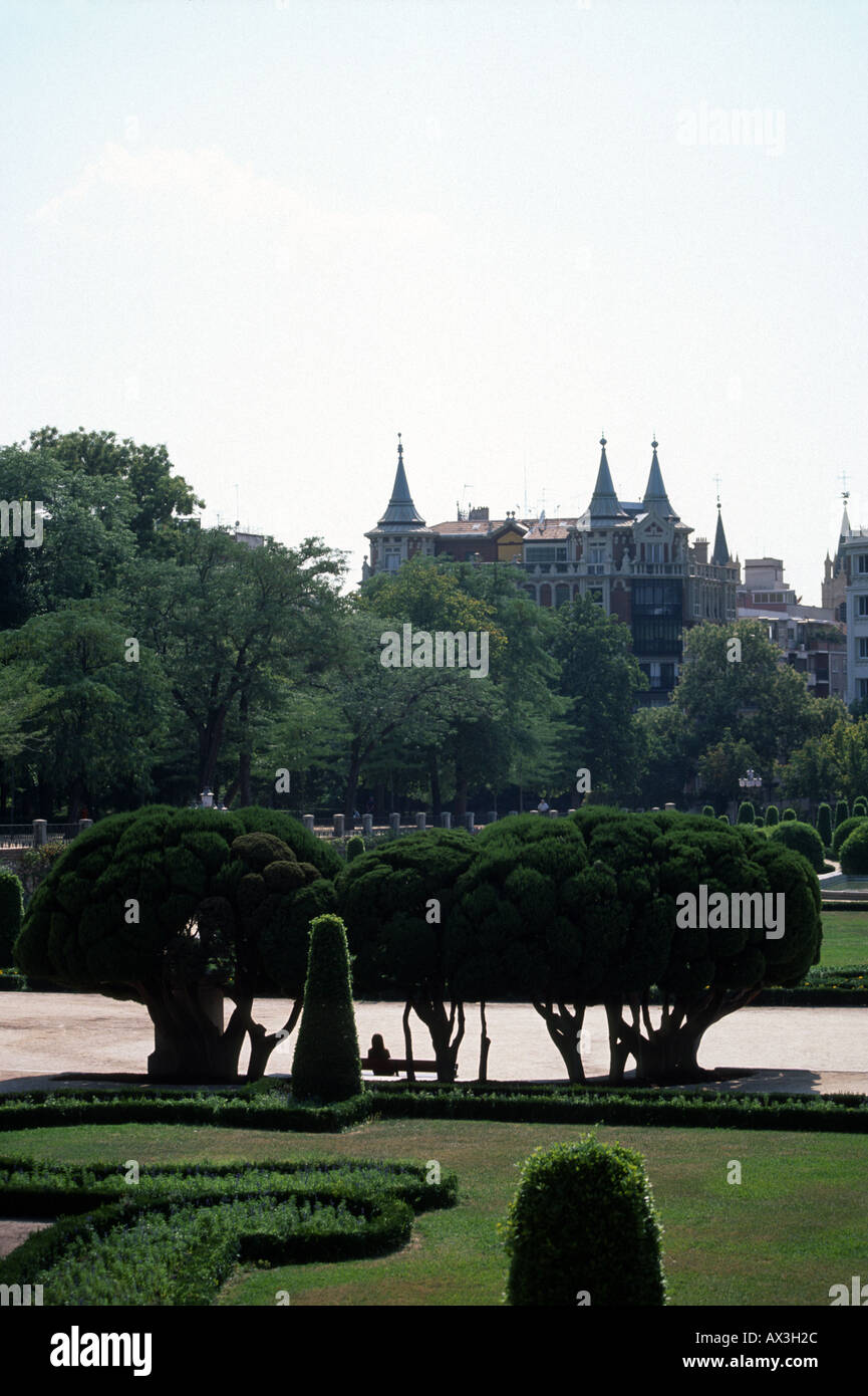Woman beneath trees on hi-res stock photography and images - Alamy
