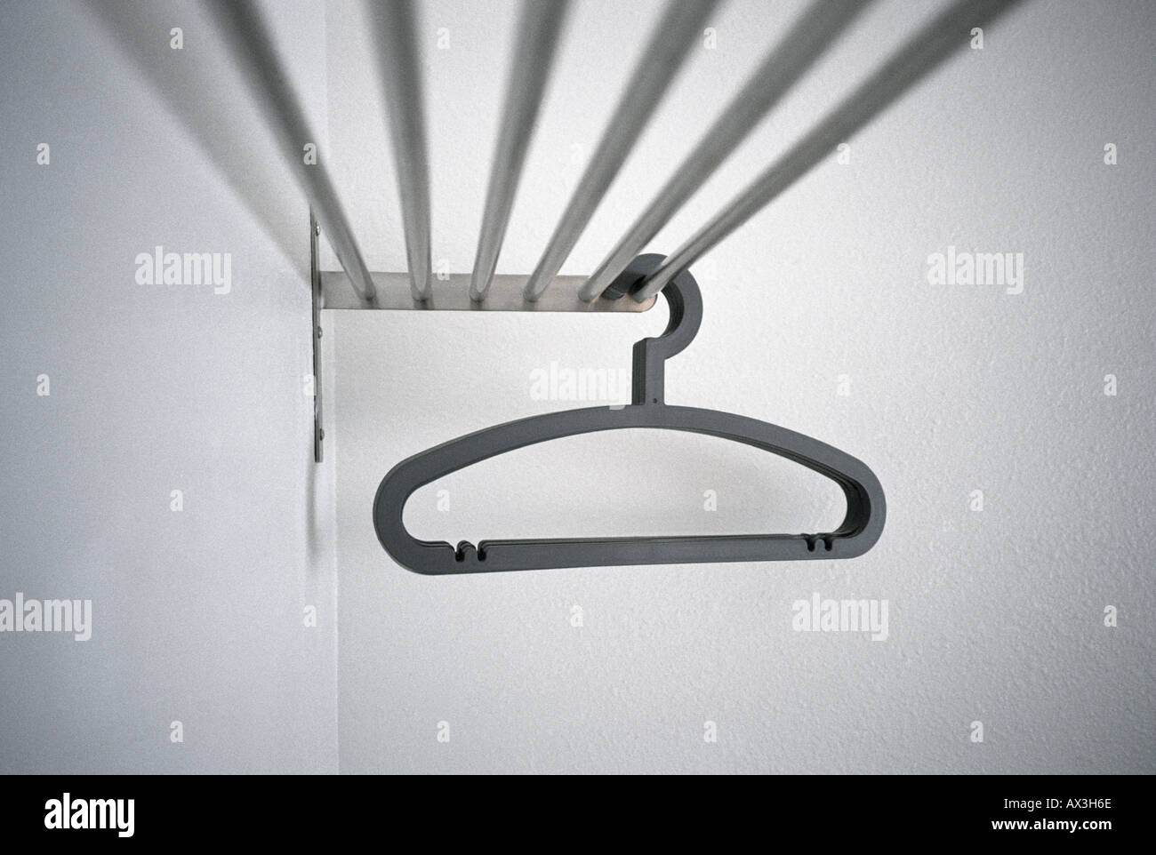 Hangers on clothes rack Stock Photo - Alamy