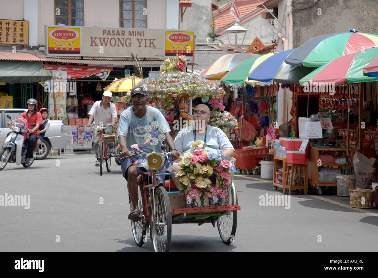 Trishaw and Tourist tour, Malacca, Malaysia Stock Photo - Alamy
