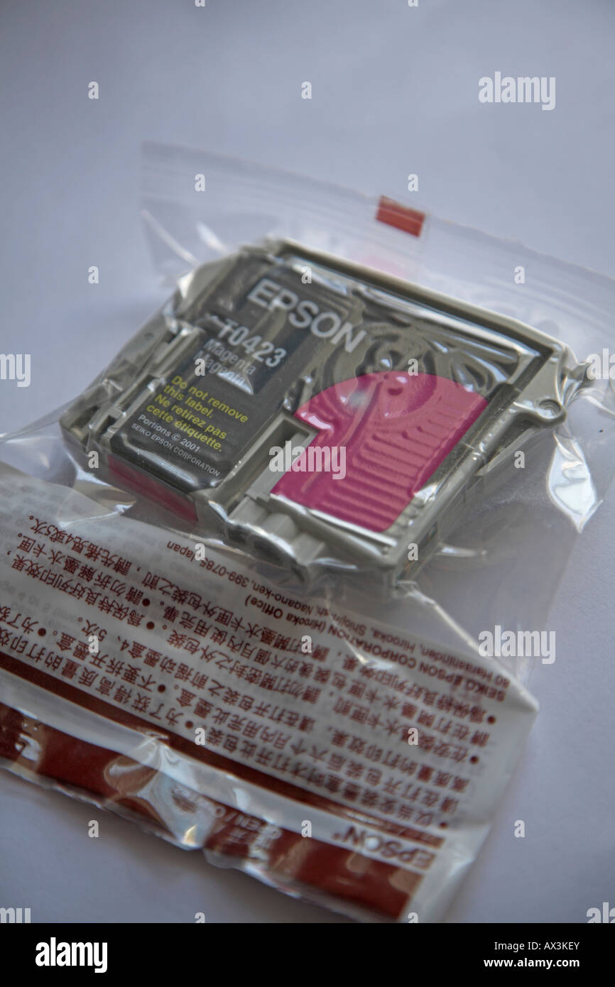 Epson magenta printer ink cartridge container Stock Photo - Alamy