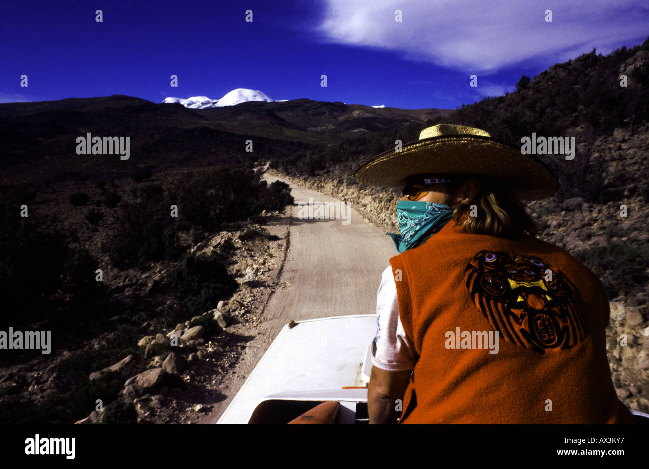 View from the top of a bus crossing Peru's Altiplano, with snow-capped ...
