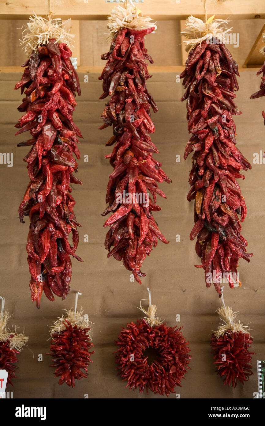 Hanging strings of New Mexico red chile pepper Stock Photo - Alamy