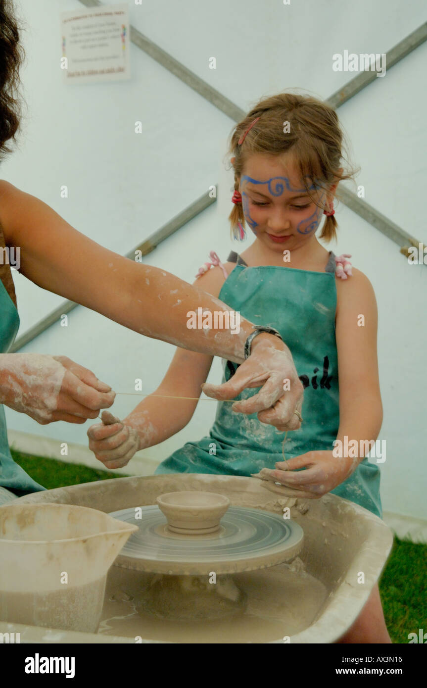Young girl making a pot Stock Photo - Alamy