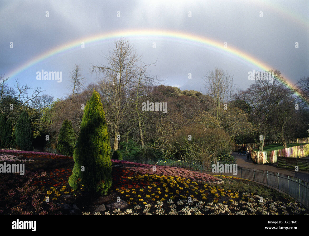 Rainbow over rural landscape Stock Photo - Alamy