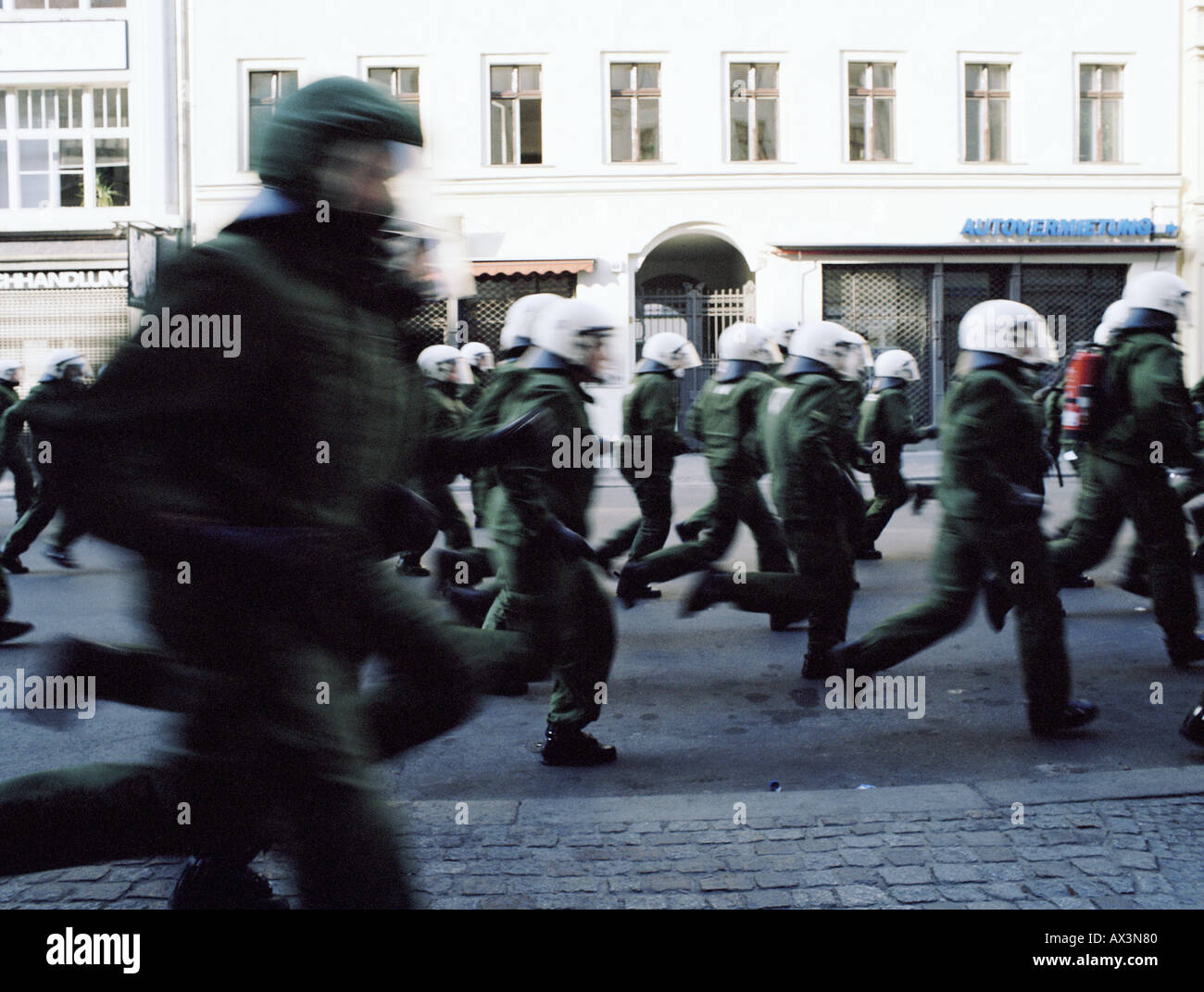 Riot police running hi-res stock photography and images - Alamy