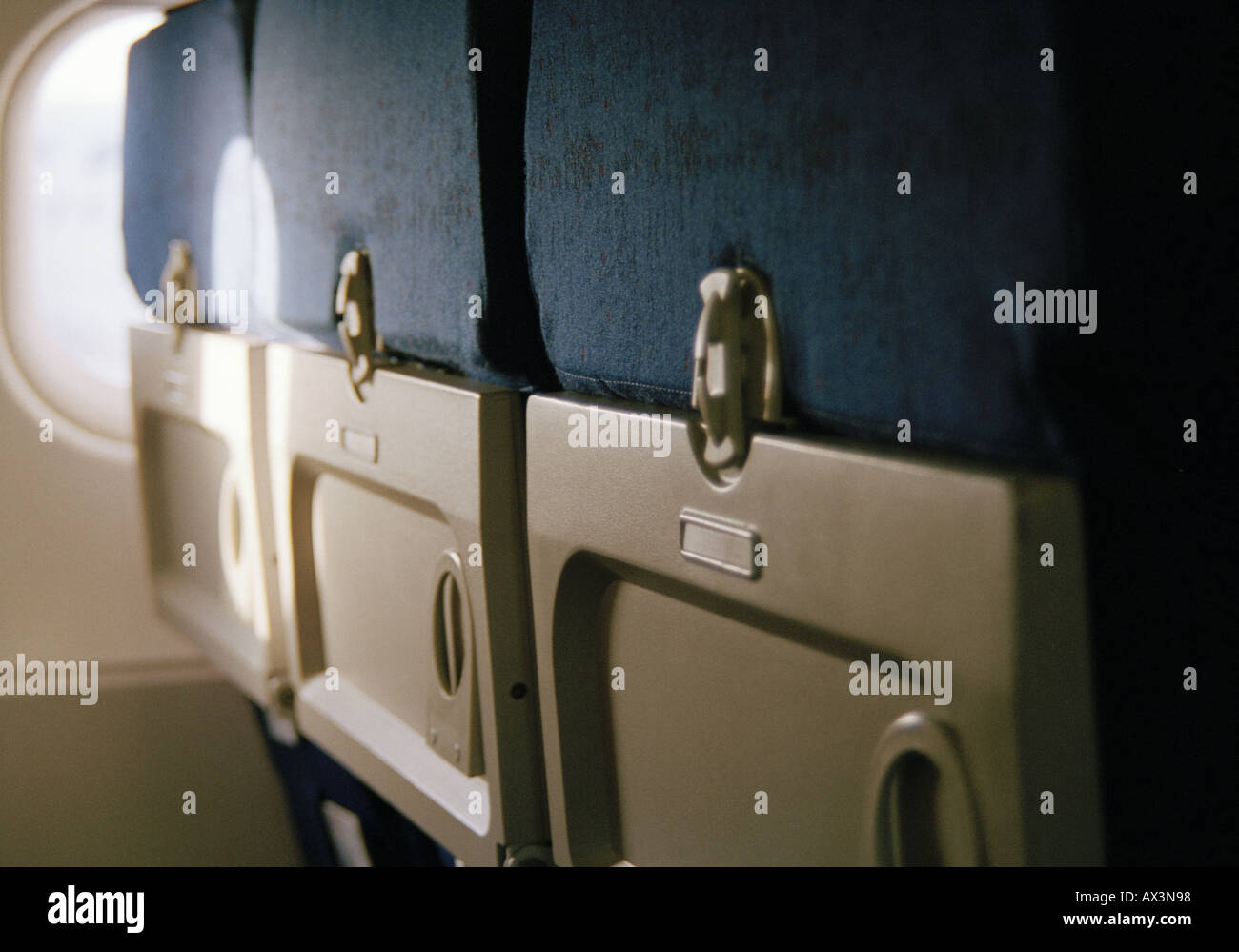 Back of airplane seats Stock Photo - Alamy