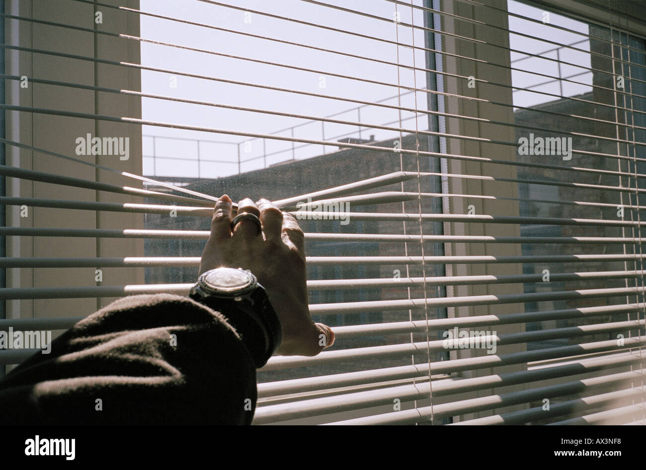 Hand pulling blinds hi-res stock photography and images - Alamy