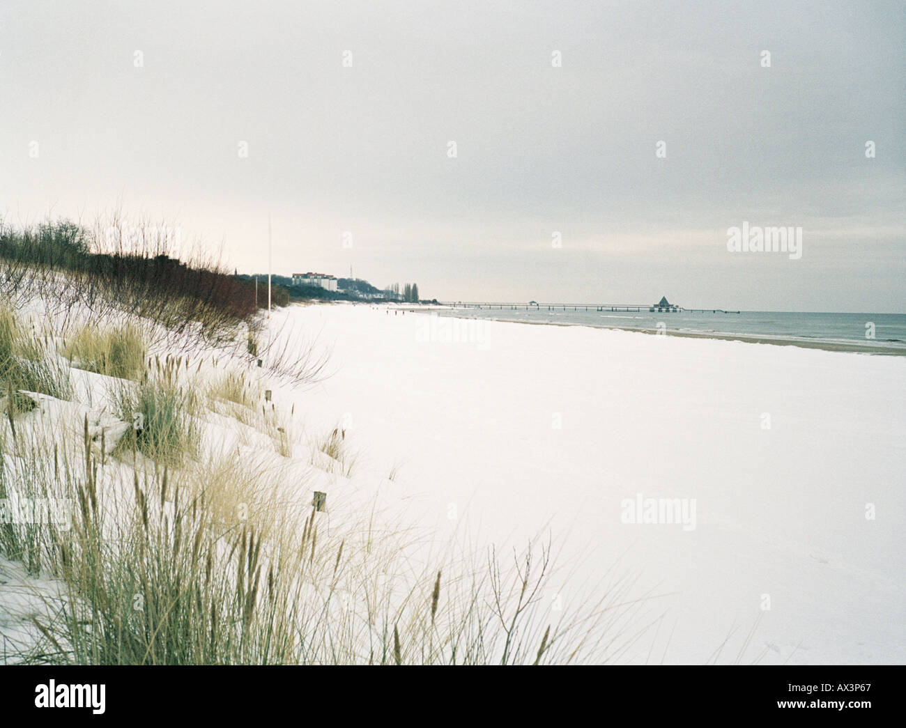 Snow covered beach Stock Photo - Alamy