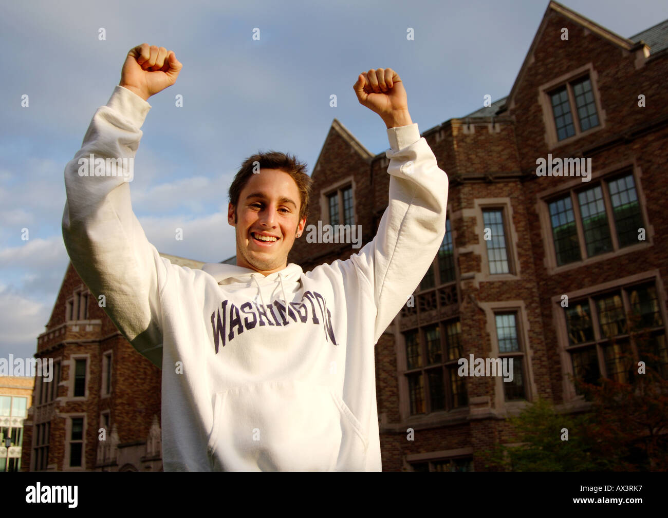 Portrait of an elated young man Stock Photo - Alamy