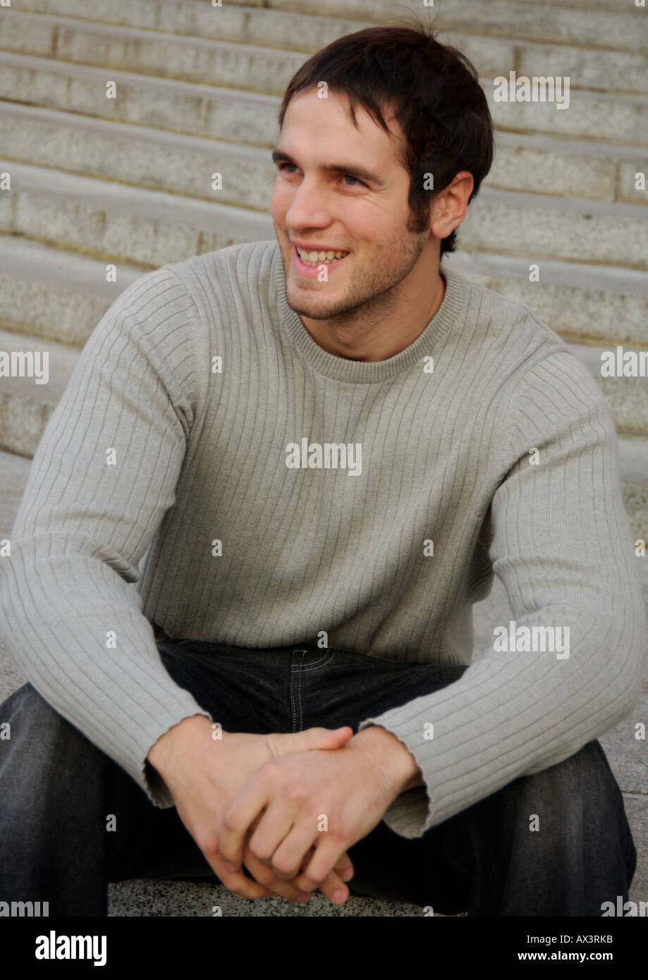 Portrait of a cheerful young man Stock Photo - Alamy