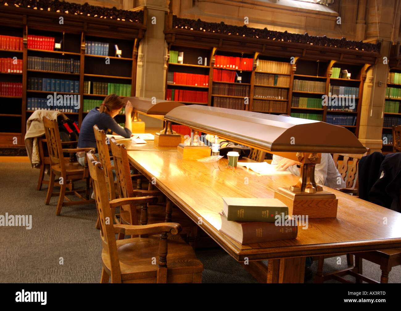 View of a reading lamp in a library Stock Photo - Alamy