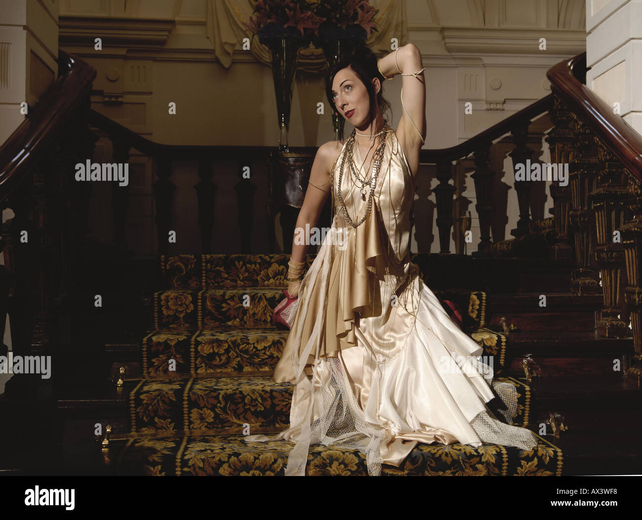 Woman in dress kneeling on hi-res stock photography and images - Alamy