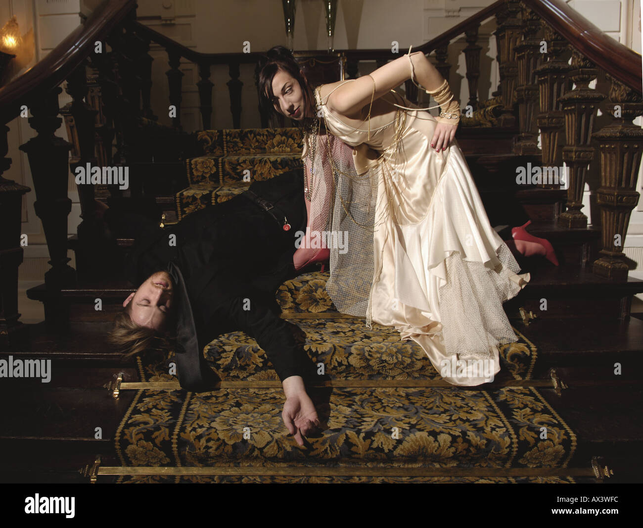 Man kneeling over woman hi-res stock photography and images - Alamy