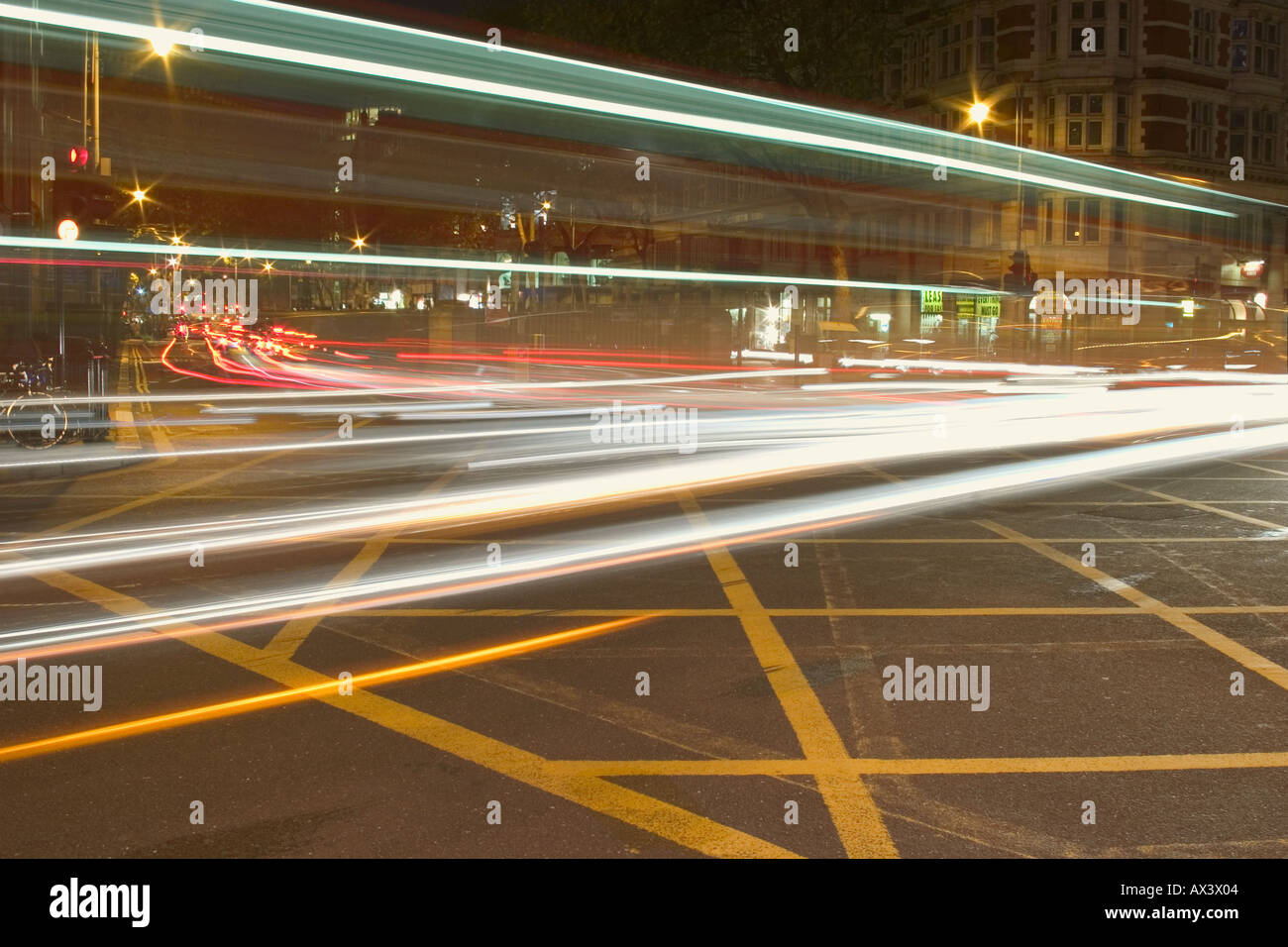 Road traffic light trails and box junction road markings. Holborn ...
