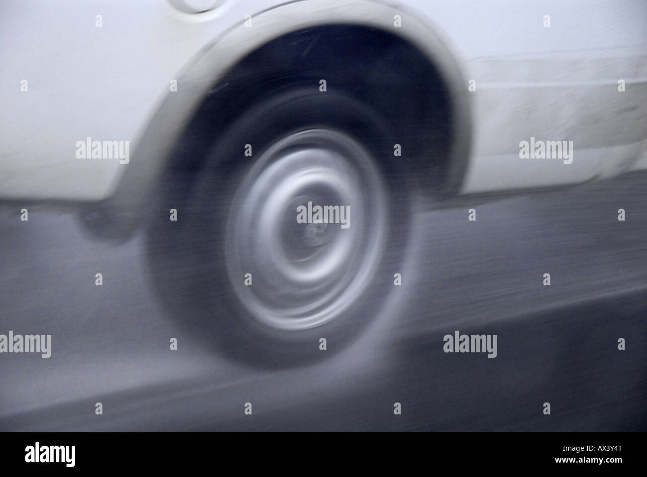 Van wheel in the rain Stock Photo - Alamy