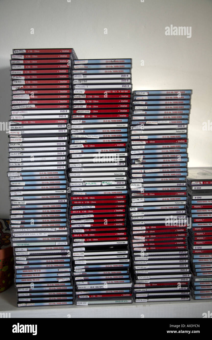Compact disc CDs and DVDs stacked up Stock Photo - Alamy