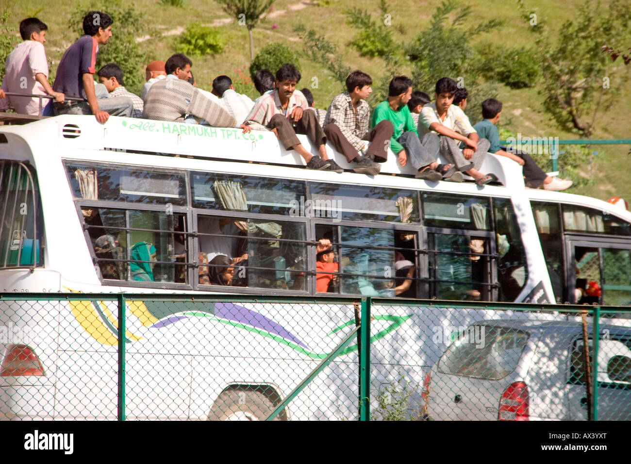 Typical scene in India of a people crowed onto and into a bus Stock ...