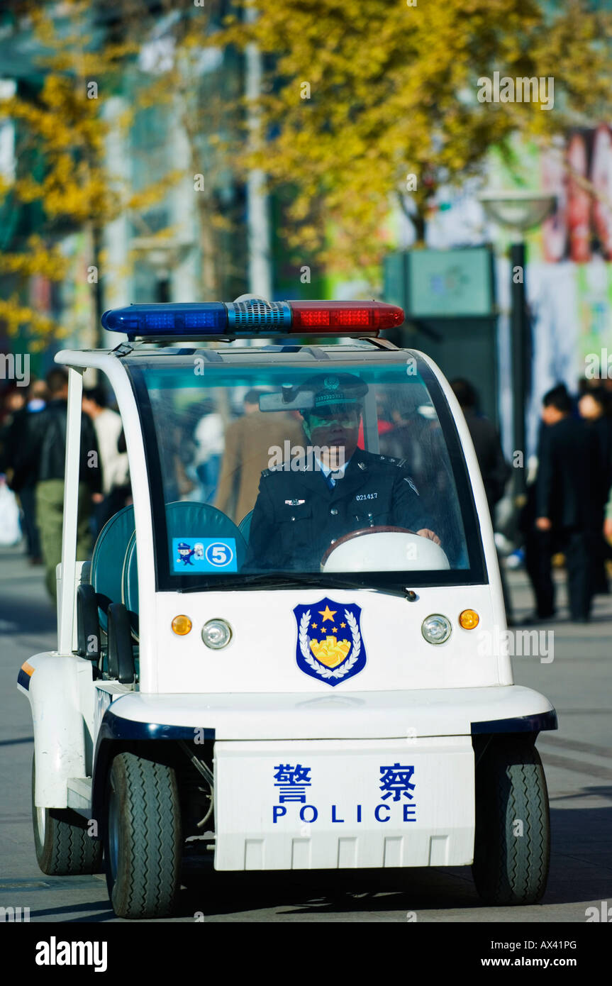 China, Beijing. A small police car patrolling the streets Stock Photo ...