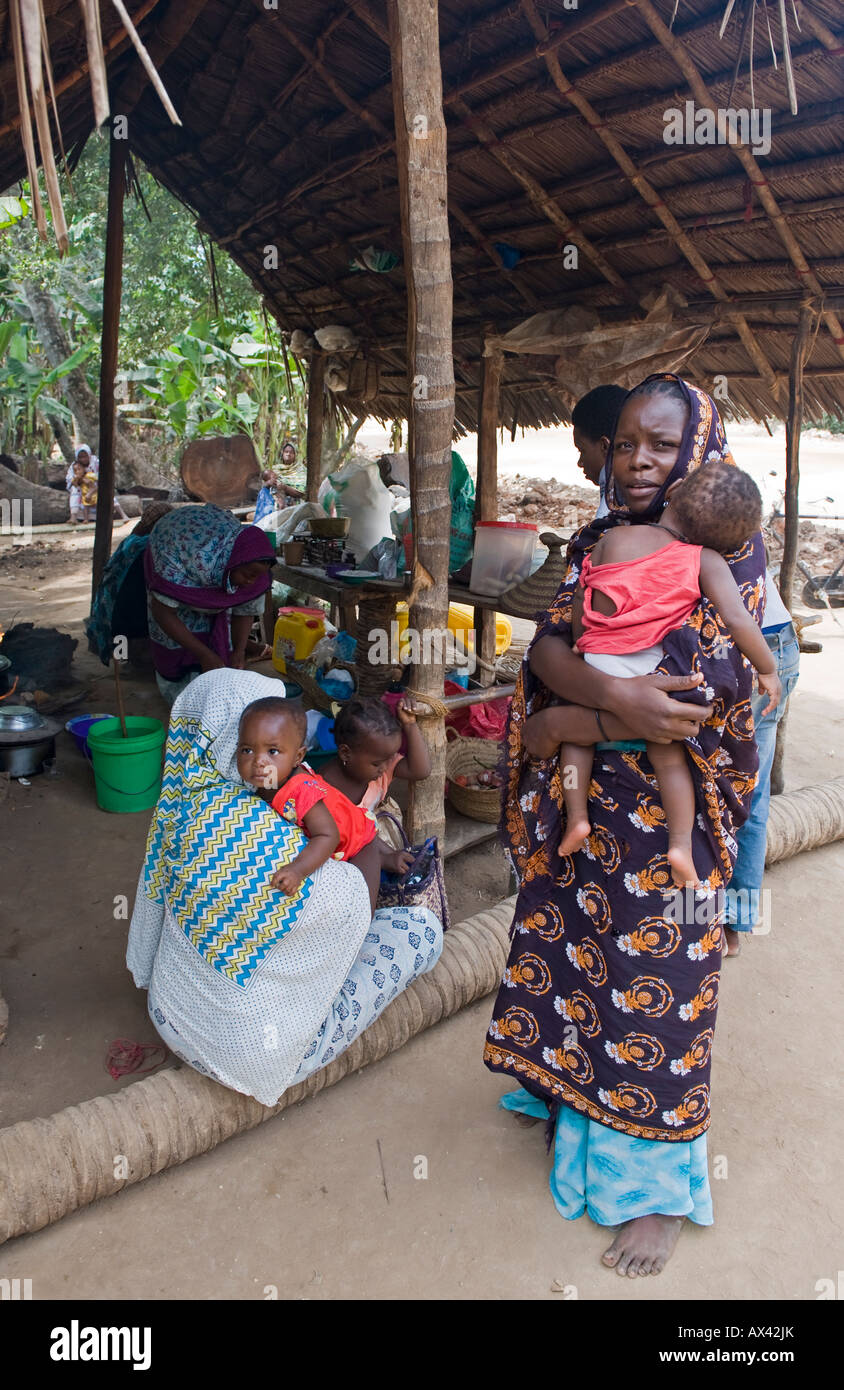 Zanzibar native woman cook the food in a village of the interland Stock ...