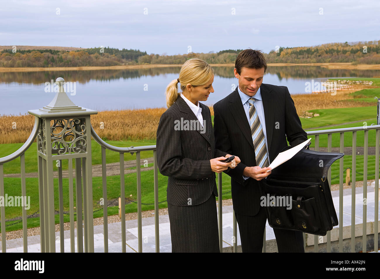 UK, Northern Ireland, Fermanagh, Enniskillen. Business people have an ...