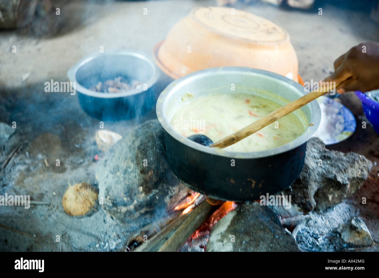 Zanzibar native woman cook the food in a village of the interland Stock ...