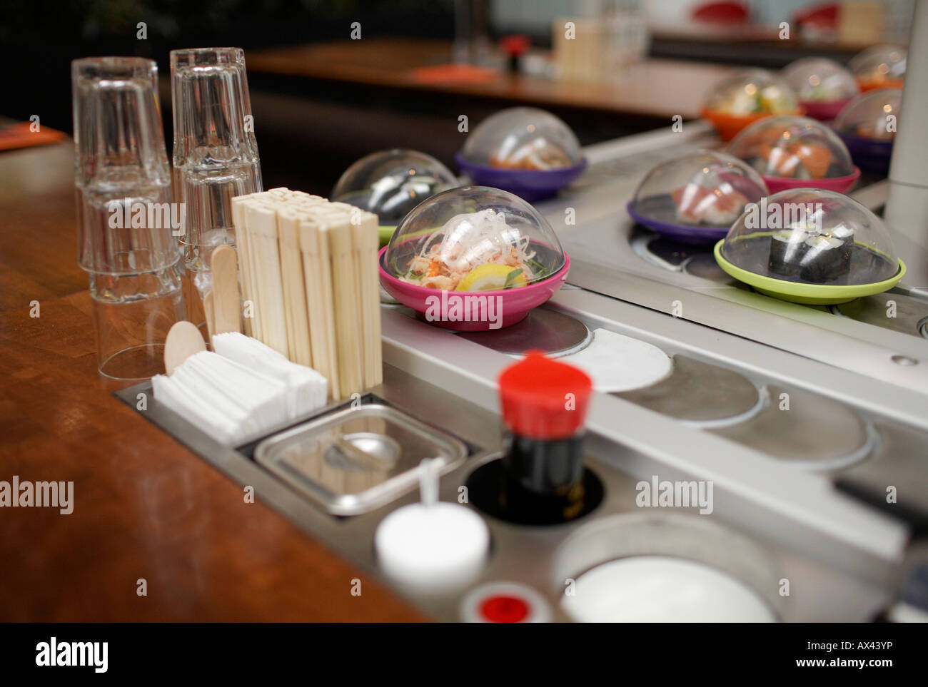 Moving sushi restaurant hi-res stock photography and images - Alamy