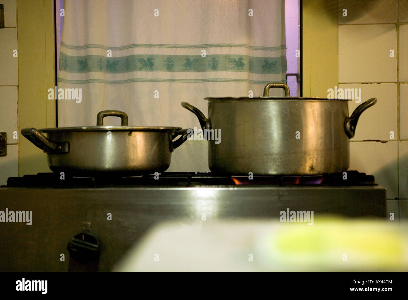 cooking pots on cooking stove Stock Photo - Alamy