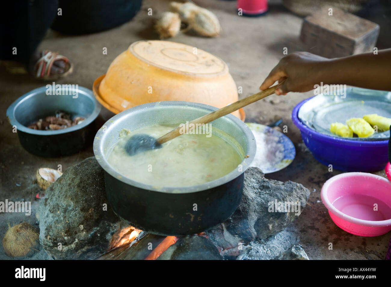 Zanzibar native woman cook the food in a village of the interland Stock ...