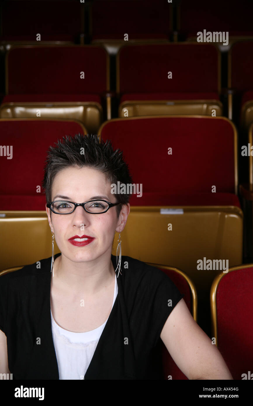 Woman movie theatre hi-res stock photography and images - Alamy