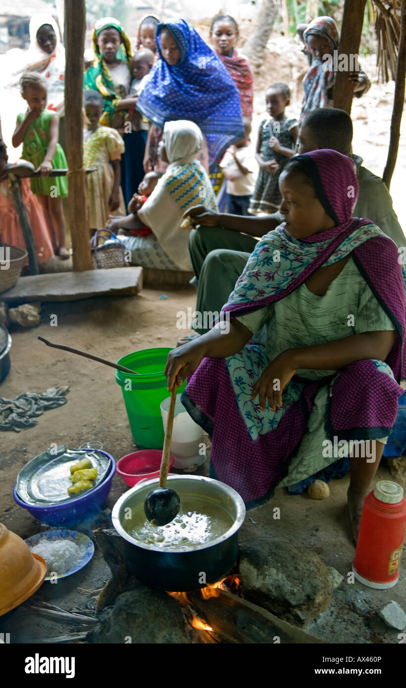 Zanzibar native woman cook the food in a village of the interland Stock ...