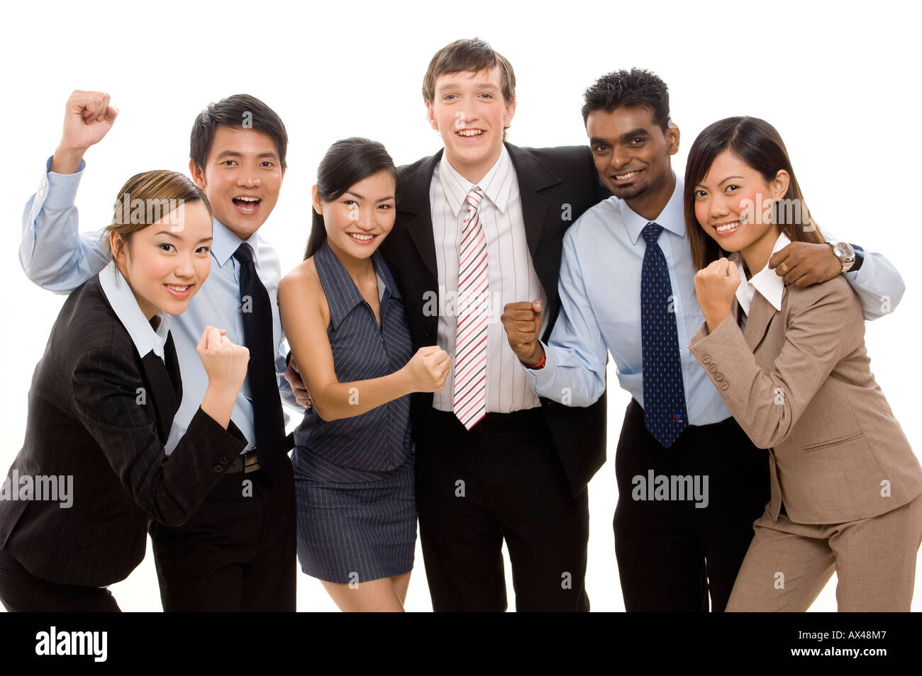 A diverse business team celebrates a success Stock Photo - Alamy