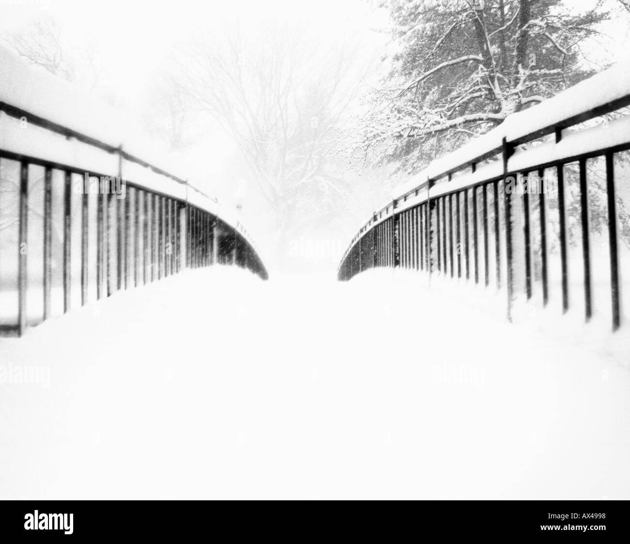 Snow covered bridge Stock Photo - Alamy