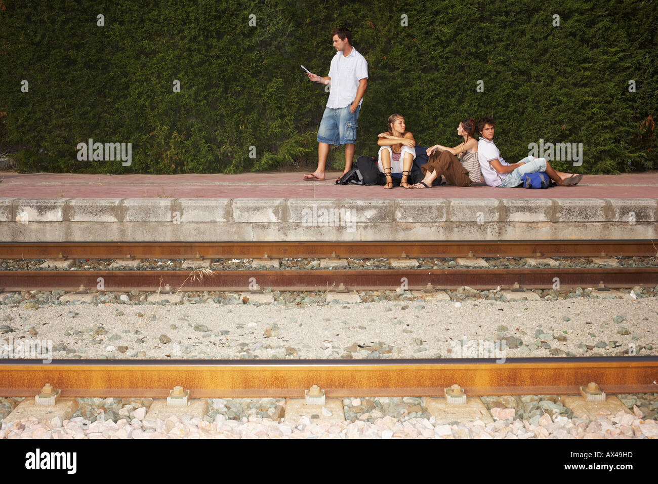 People waiting train bored hi-res stock photography and images - Alamy