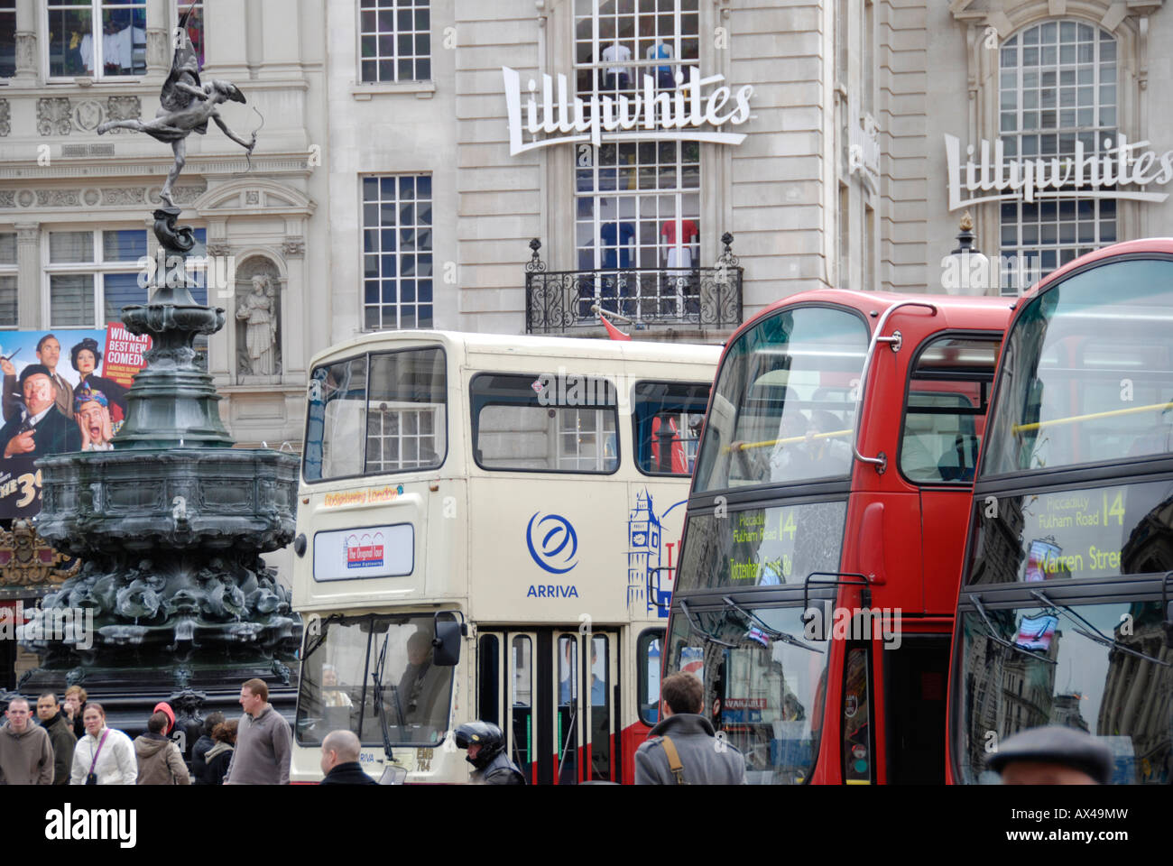 Three buses in Piccadilly Circus London Stock Photo - Alamy