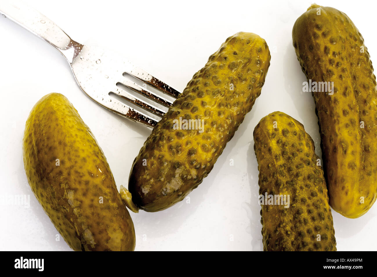 Pickles on fork, close-up, elevated view Stock Photo - Alamy