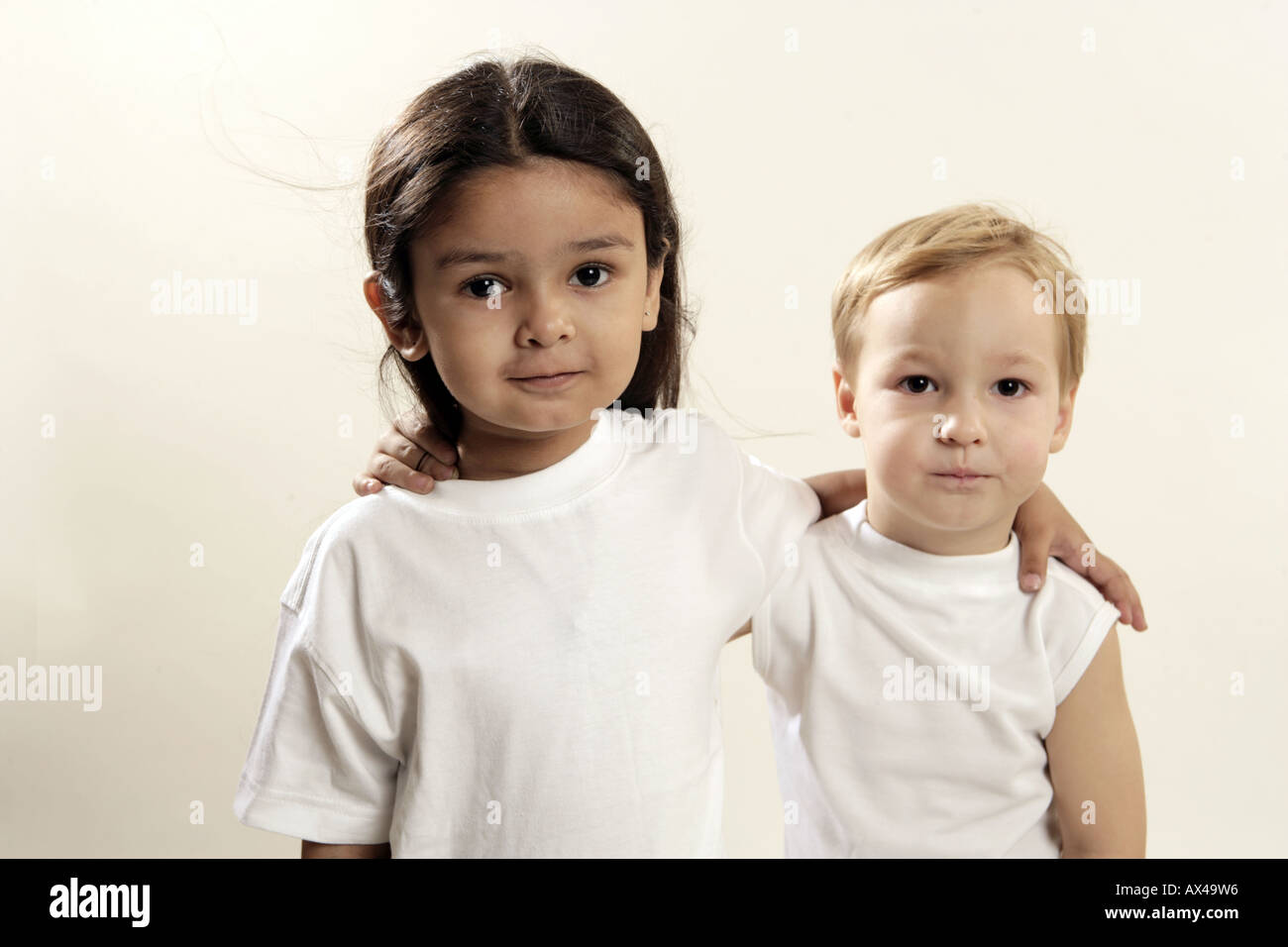 Portrait of a Indian girl standing with a foreigner boy Stock Photo - Alamy