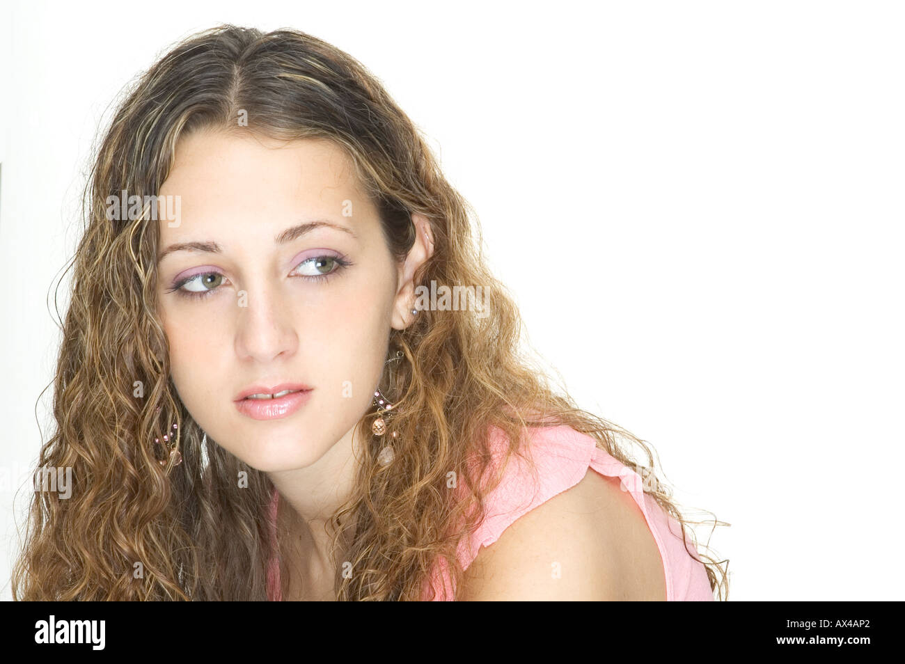 A pretty teenage model looks to the side Stock Photo - Alamy