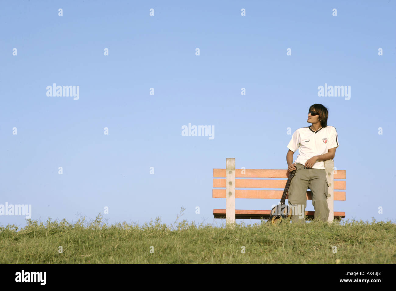 Vacation leaning bench sitting hi-res stock photography and images - Alamy