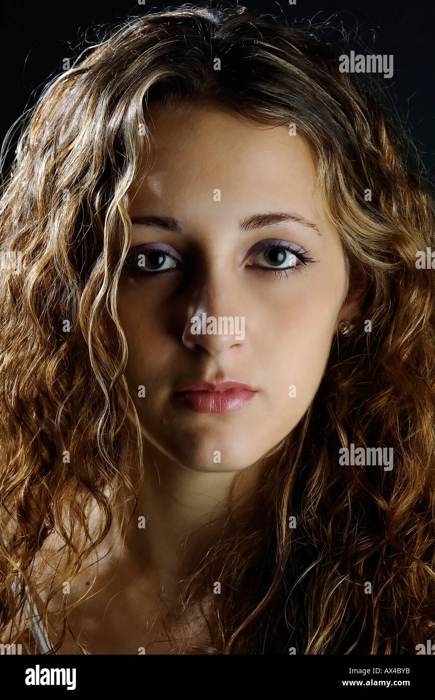 A serious portrait of an attractive female model Stock Photo - Alamy