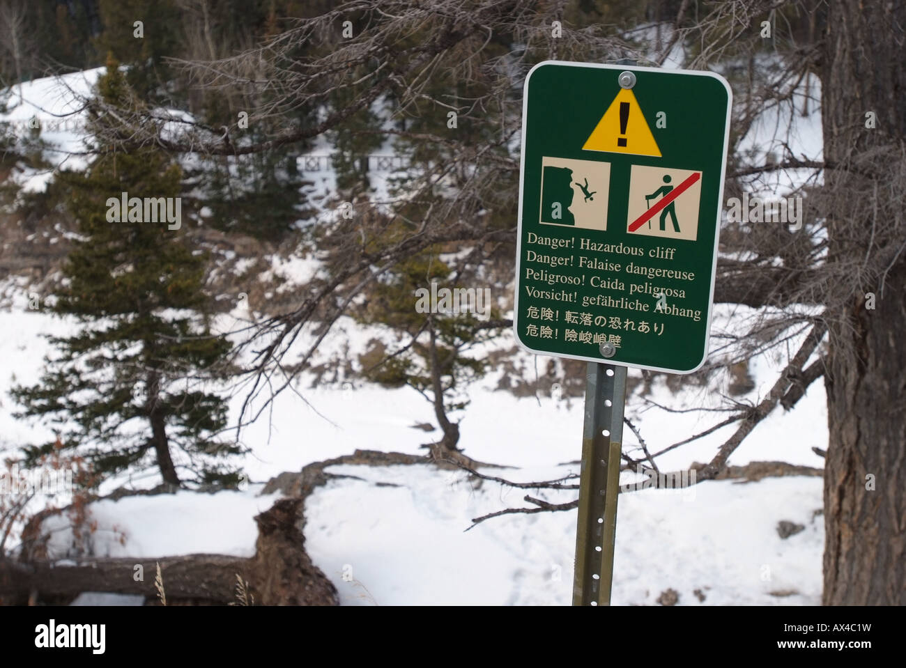 A sign warning of danger in six 6 languages Banff Alberta Canada Stock ...