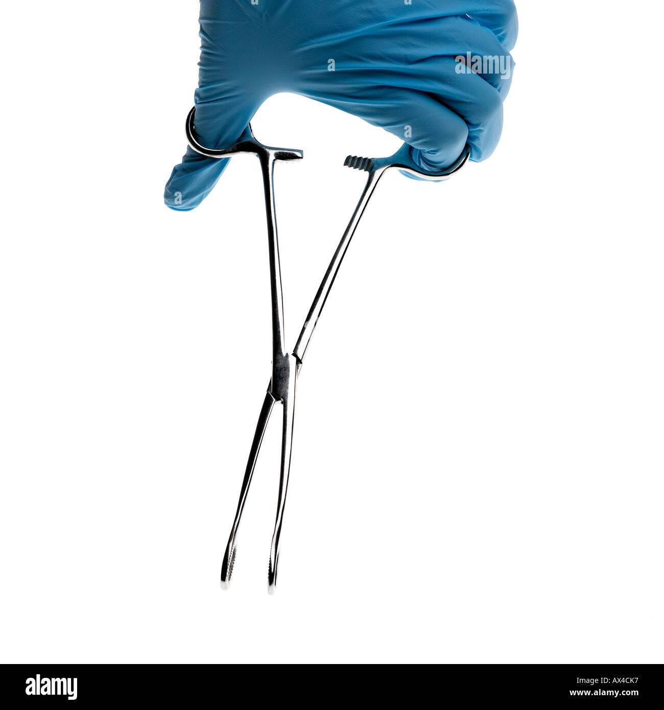 Hand glove hold surgical forceps hi-res stock photography and images ...