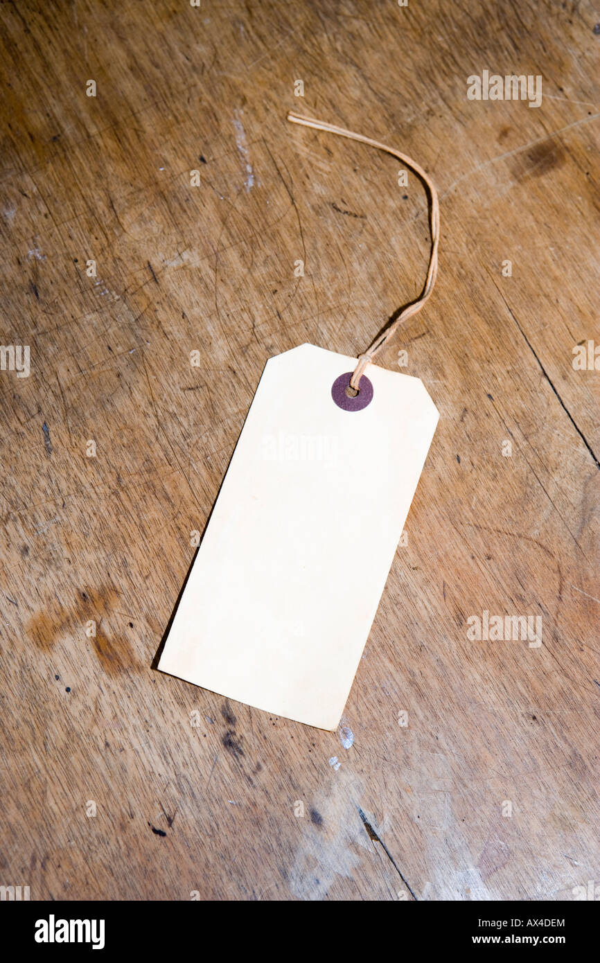 A blank label on wooden table Stock Photo - Alamy
