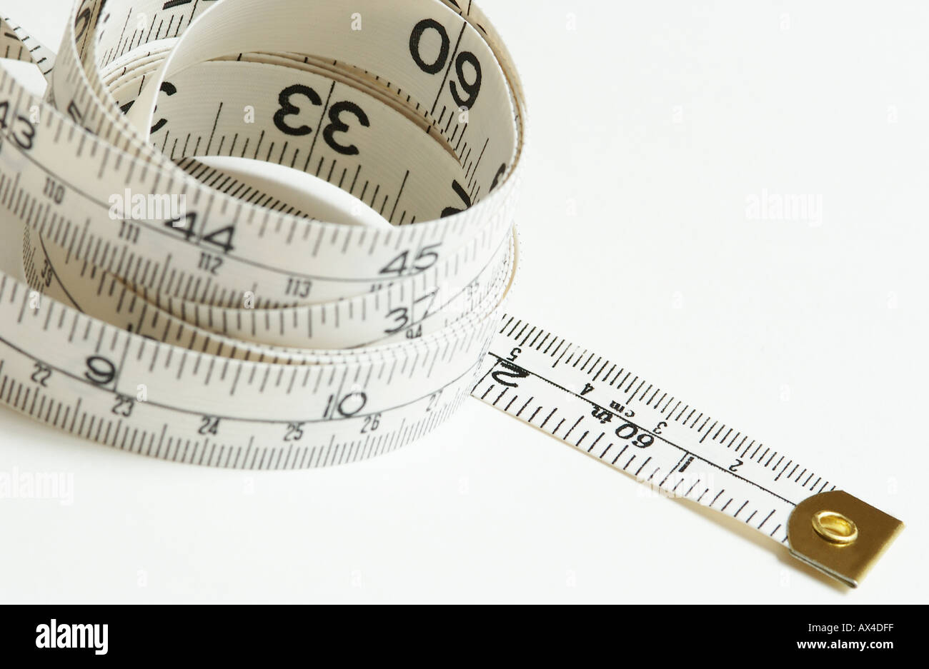 Close up of Tape measure on white background Stock Photo - Alamy