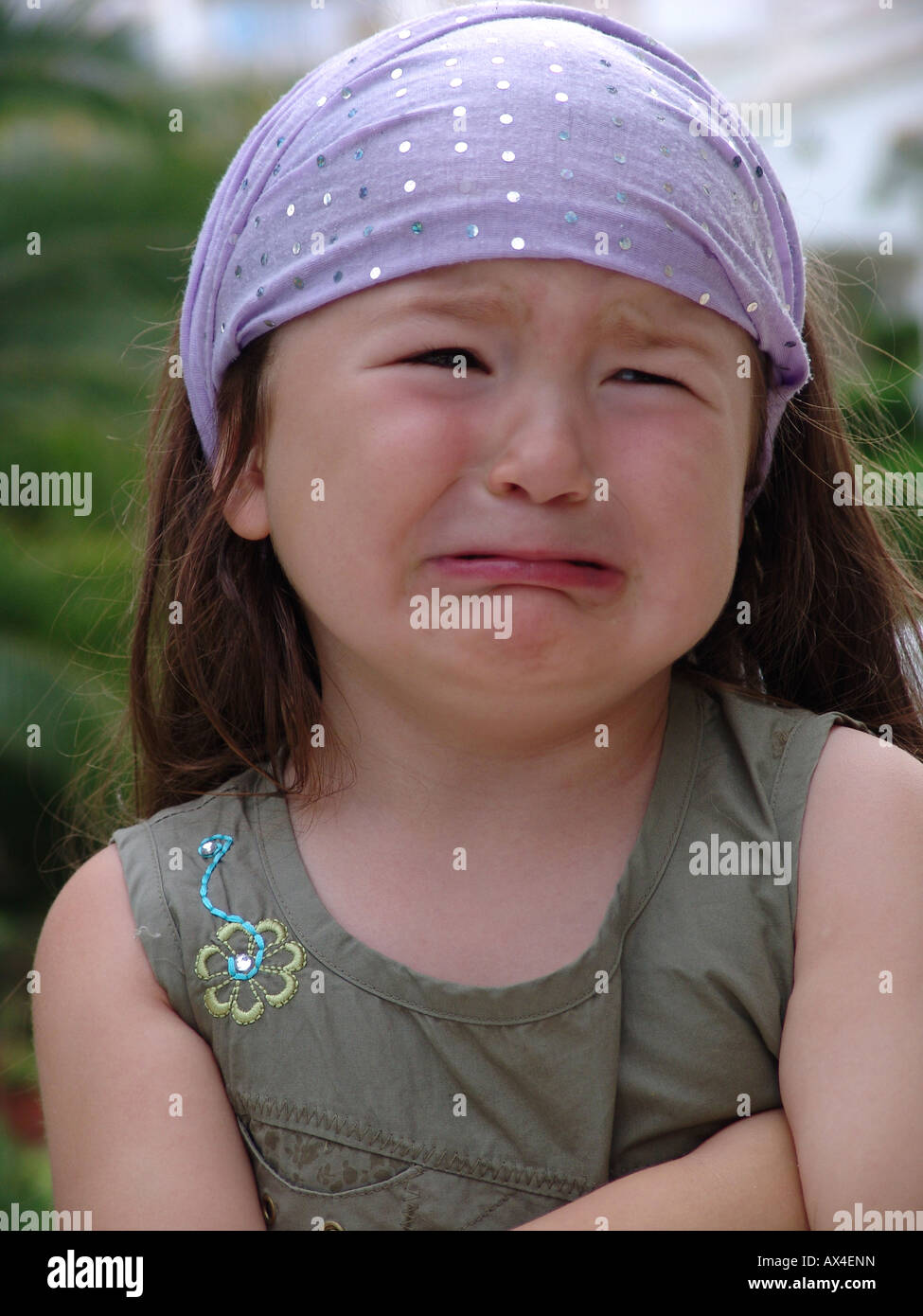 A young girl crying Stock Photo - Alamy